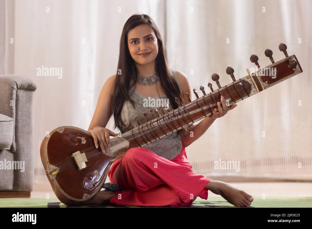 Portrait indian classical musician playing hi-res stock photography and ...