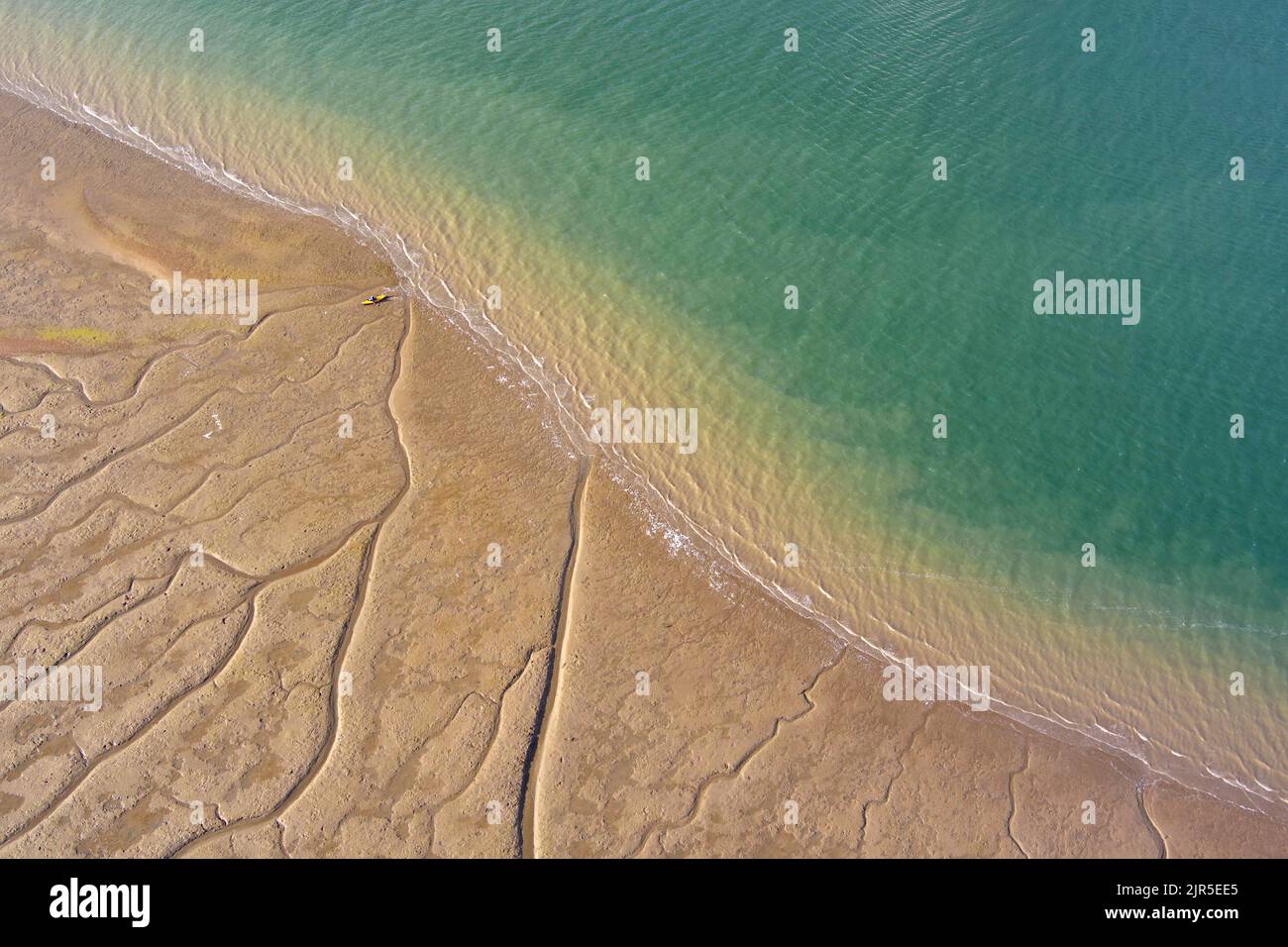 Aerial of kayaking on the mangrove sand bar on Passage Island ...