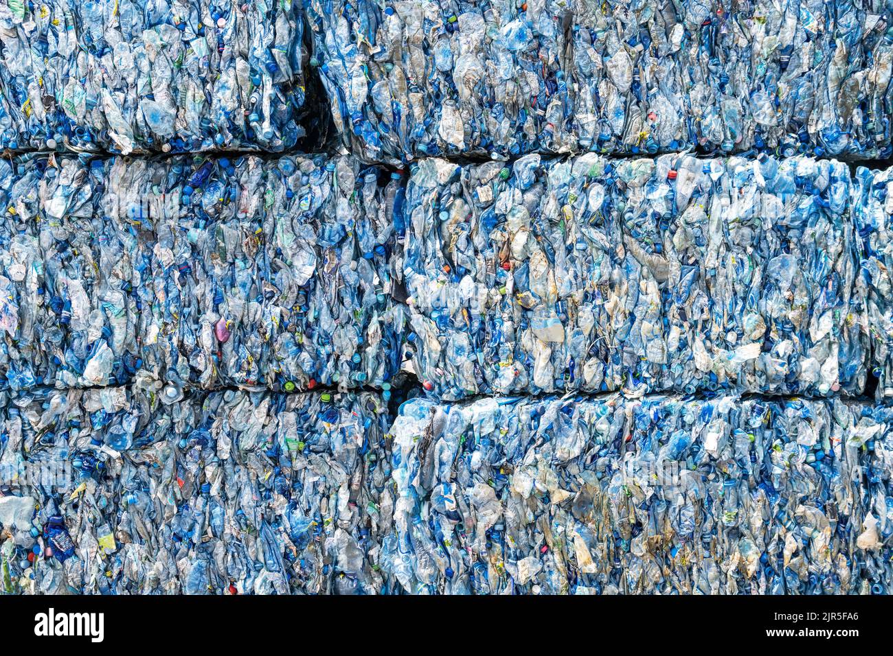 Huge Pile of Pressed PET Bottles Ready For Recycling Process. Urban ...