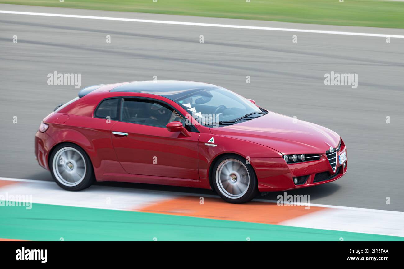 A red Alfa Romeo Brera racing car on the Valencia racing circuit Stock ...