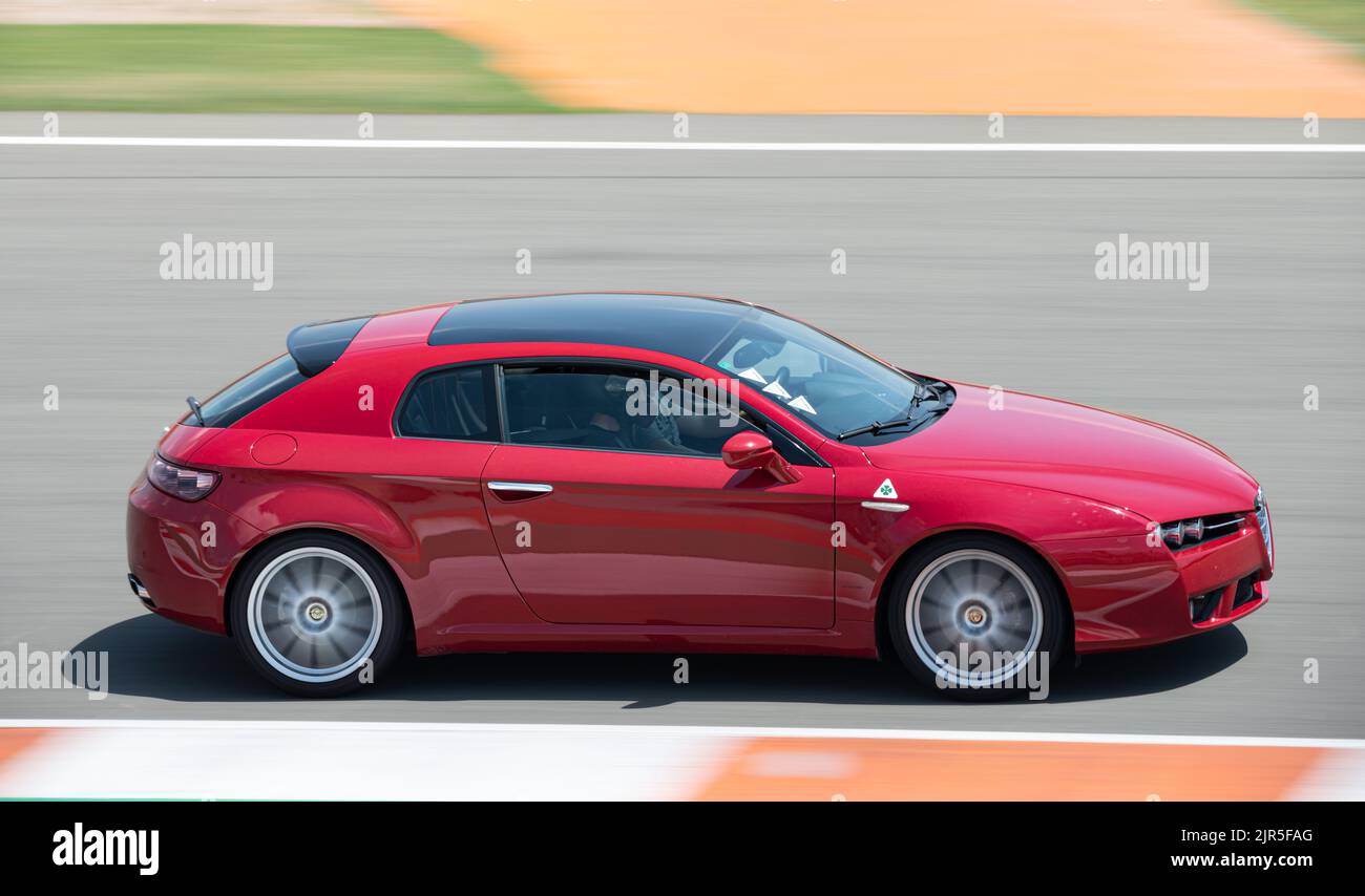 A red Alfa Romeo Brera racing car on the Valencia racing circuit Stock ...