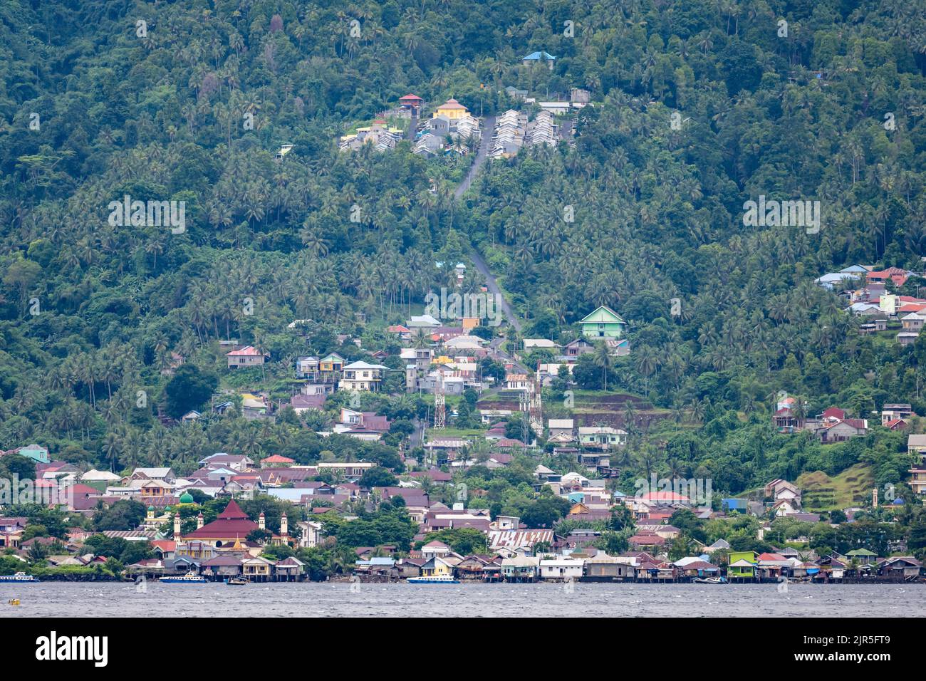 The city Kota Ternate is situated on a volcanic island. North Maluku ...
