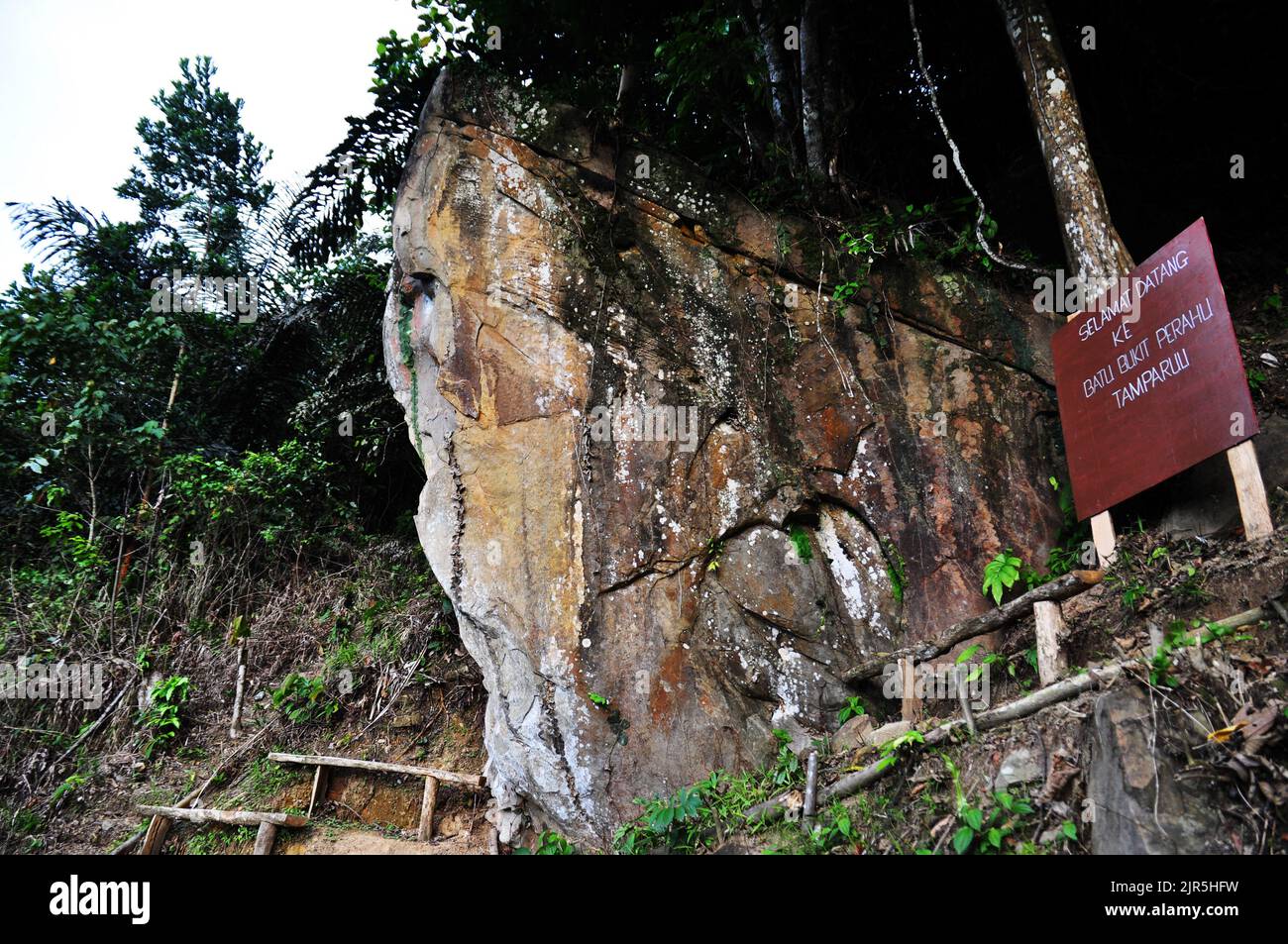 A large rock resembling the front of a ship was taken as the name Bukit ...
