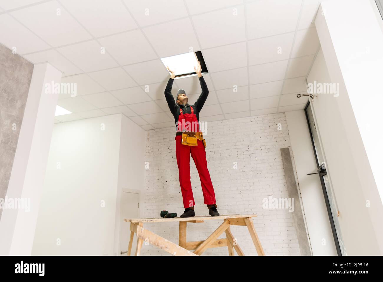 Ceiling installation with expert technicians In the room that is in the ...