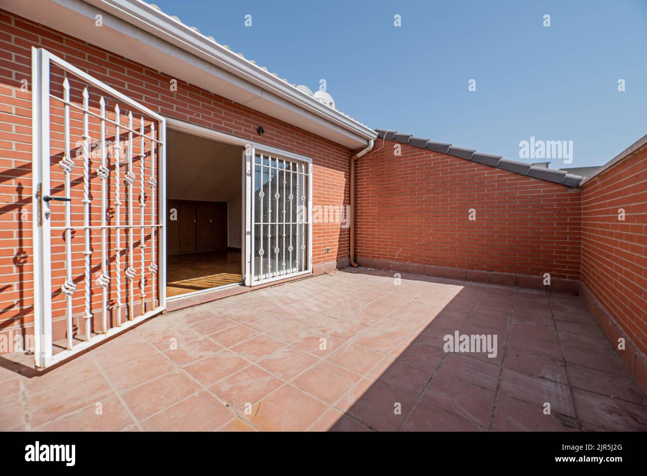 Upper terrace of an urban single-family home with dirty terrazzo floors ...