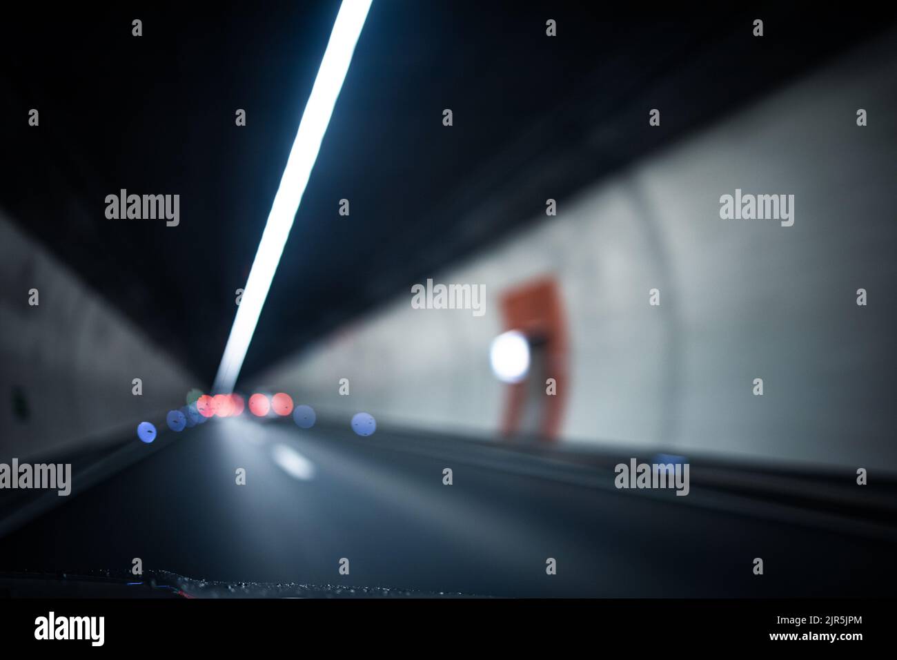 Cars on a highway going through a long modern tunnel Stock Photo - Alamy