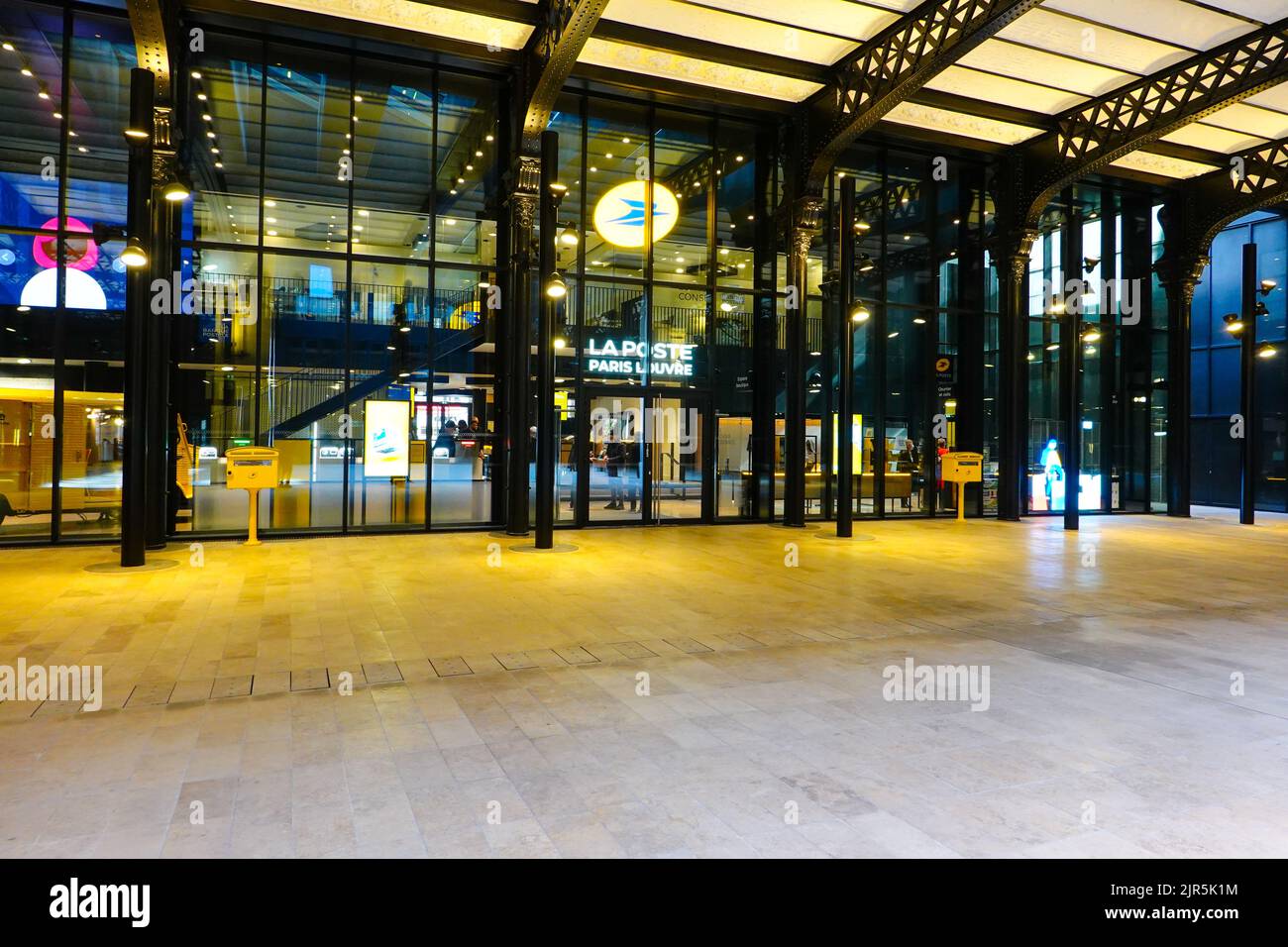 Historic, remodeled building featuring La Poste Paris Louvre, post ...