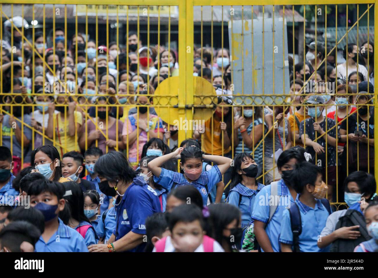 Manila, Philippines. 22nd Aug, 2022. Parents and guardians watch as ...