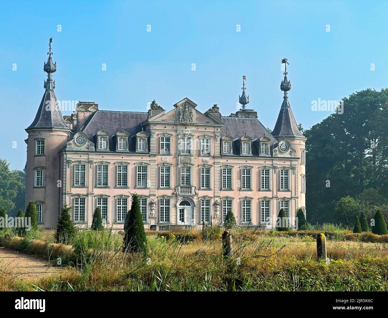 Landscape shot on the historical European Poeke castle building with it ...