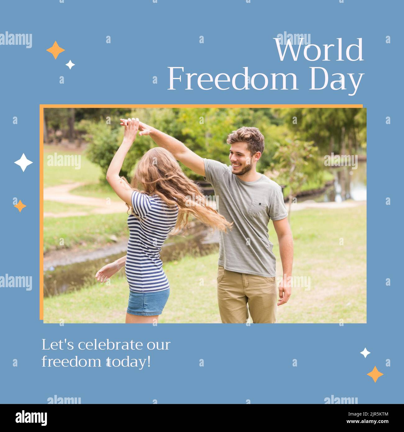 Happy caucasian young couple dancing in park with world freedom day ...