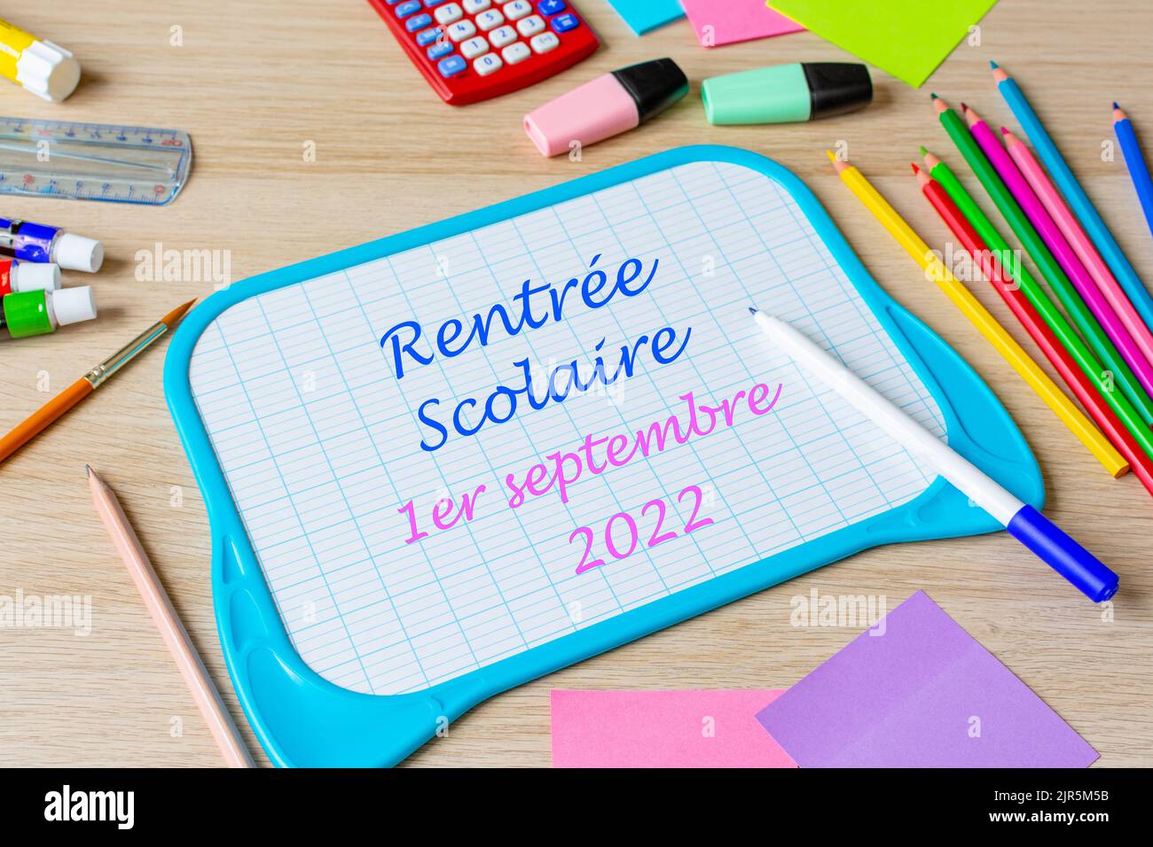 White slate with inscription "Back to school - September 1, 2022" in ...