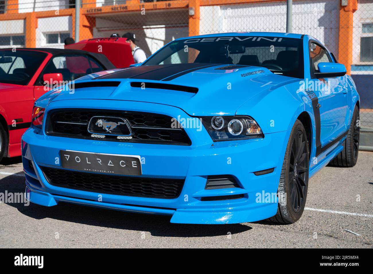 A nice blue fifth generation Boss 302 Ford Mustang parked at an ...