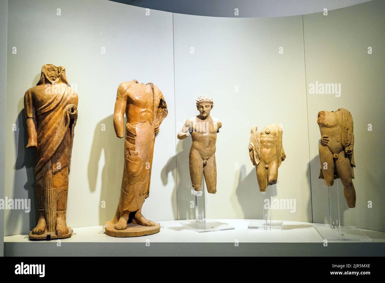 Male statues offered as gifts during the rites that marked the passage ...