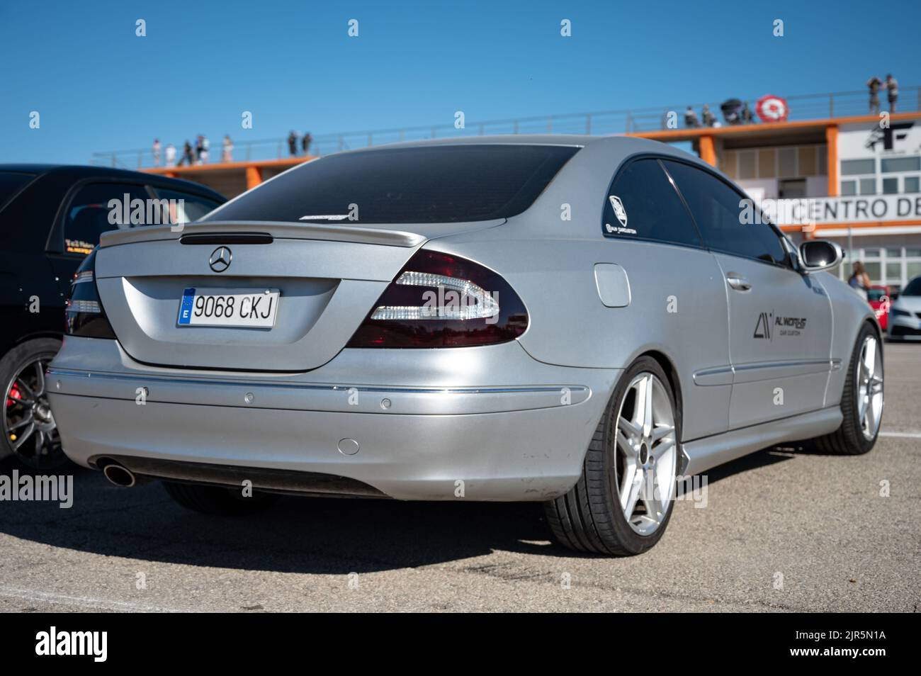 A silver Mercedes Benz CLK C209 luxury sports car parked on a street ...
