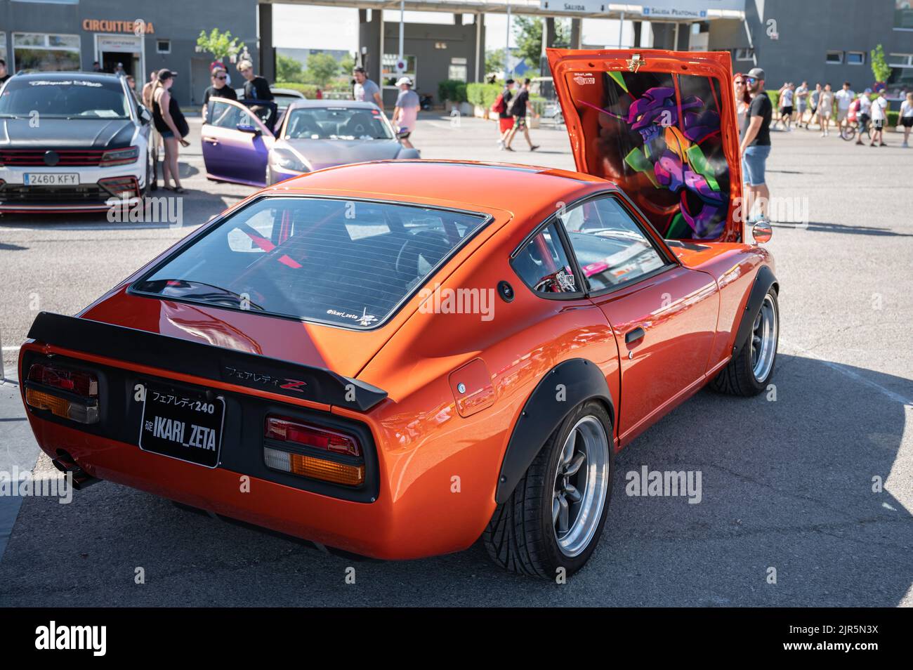 A classic orange Japanese Datsun 240z parked at an exhibition Stock Photo - Alamy