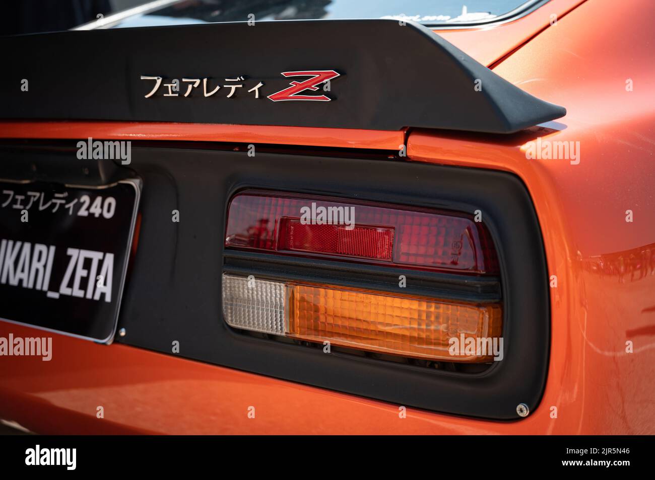 The details on a classic orange Japanese Datsun 240z parked at an exhibition Stock Photo - Alamy