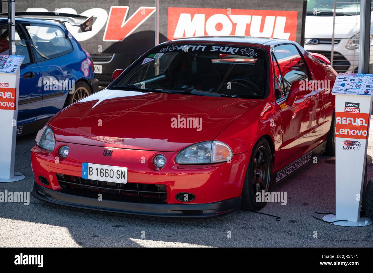A red Japanese Honda CR-X Del Sol sports car parked at an exhibit Stock ...