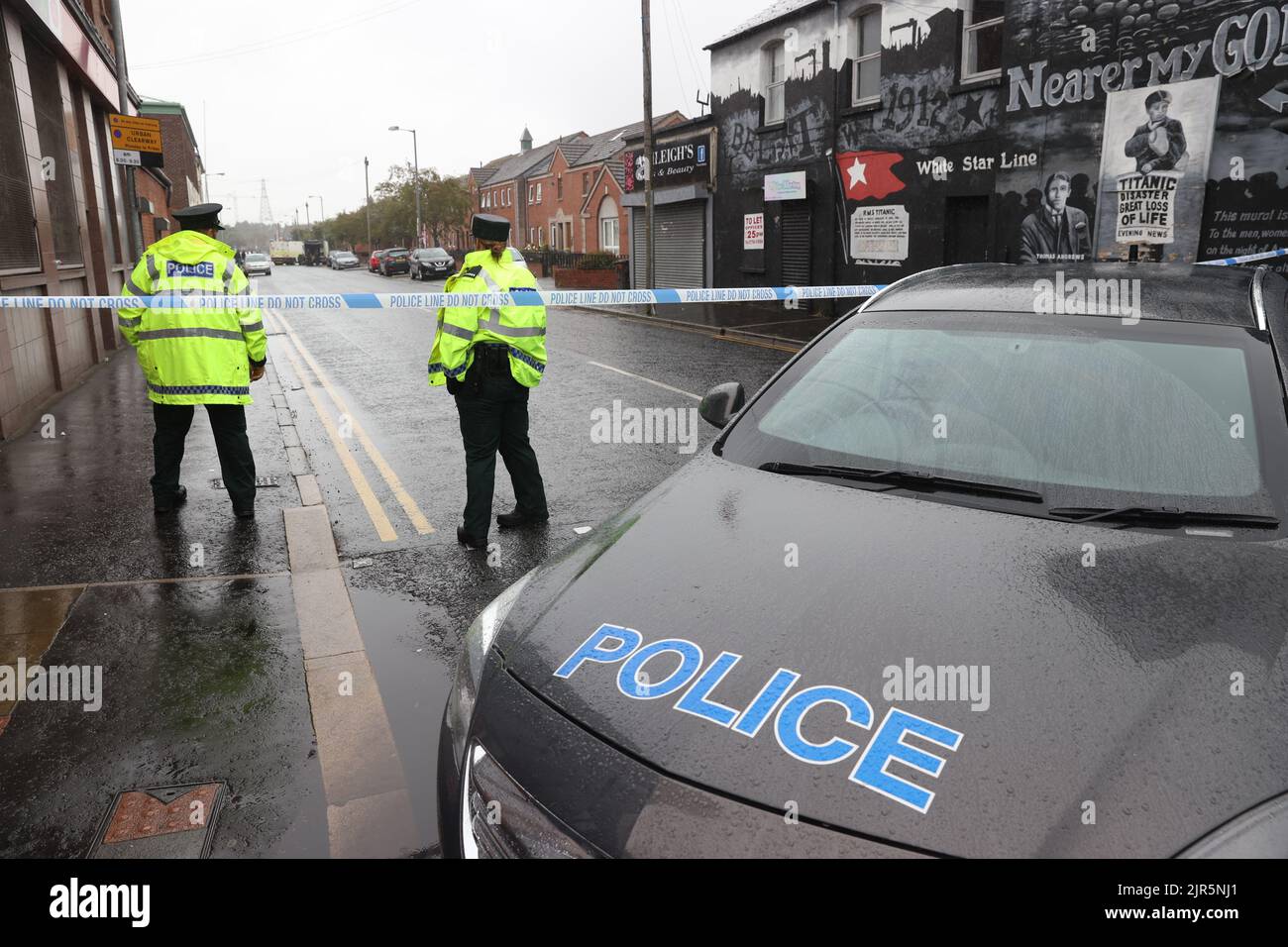 PSNI Officers stand at a cordon on the Lower Newtownards Road as Army ...