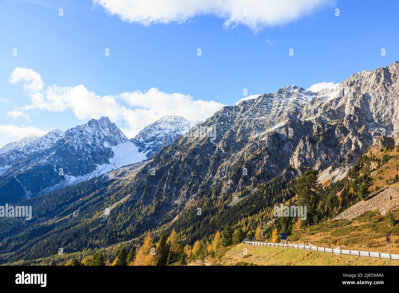 Road view in alp mountains Stock Photo - Alamy