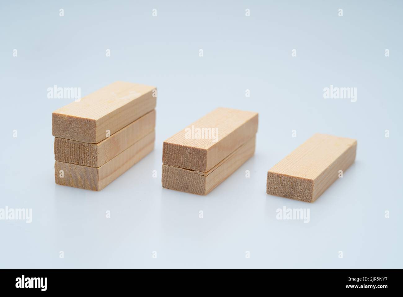 Expressing various concepts such as dominoes and business using wood ...