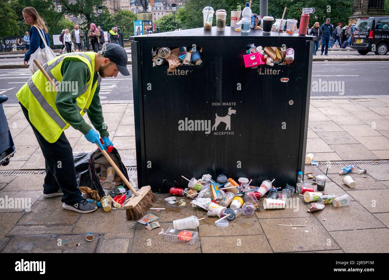 Staff from Essential Edinburgh collect some of the litter from around ...