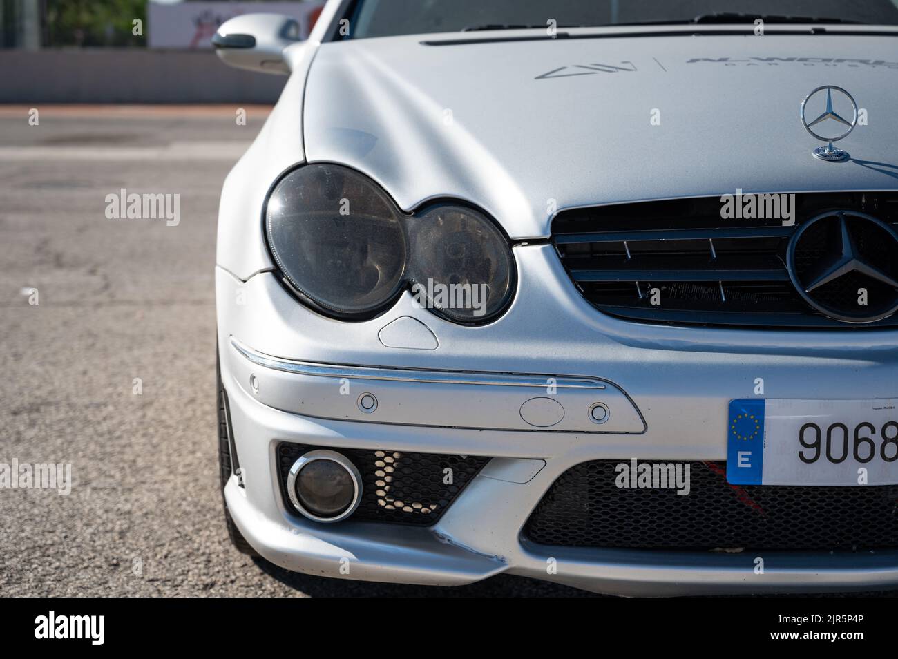 A silver Mercedes Benz CLK C209 luxury sports car parked on the street ...
