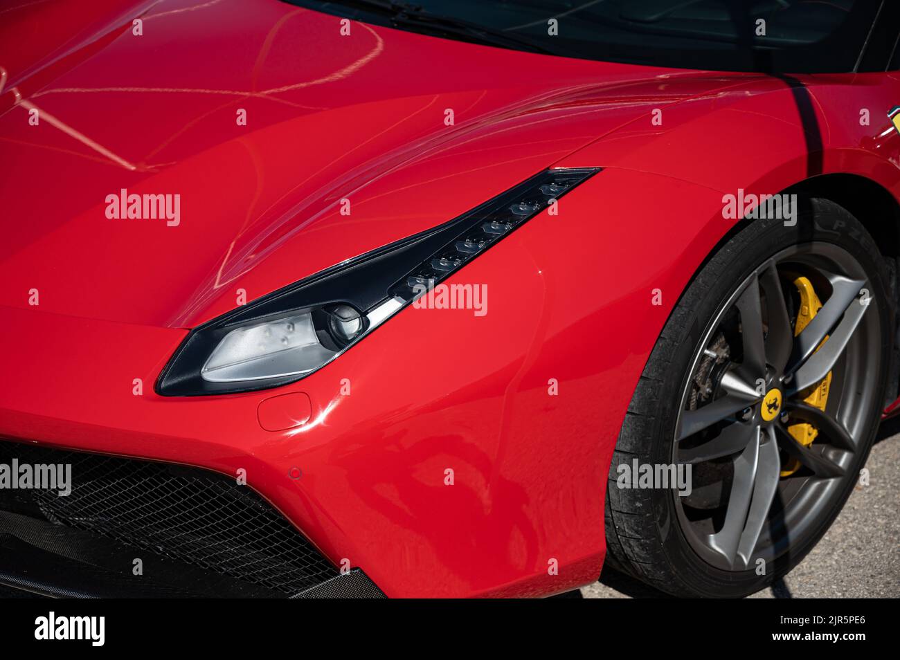 The details of the headlight of a red Ferrari 488 Stock Photo - Alamy