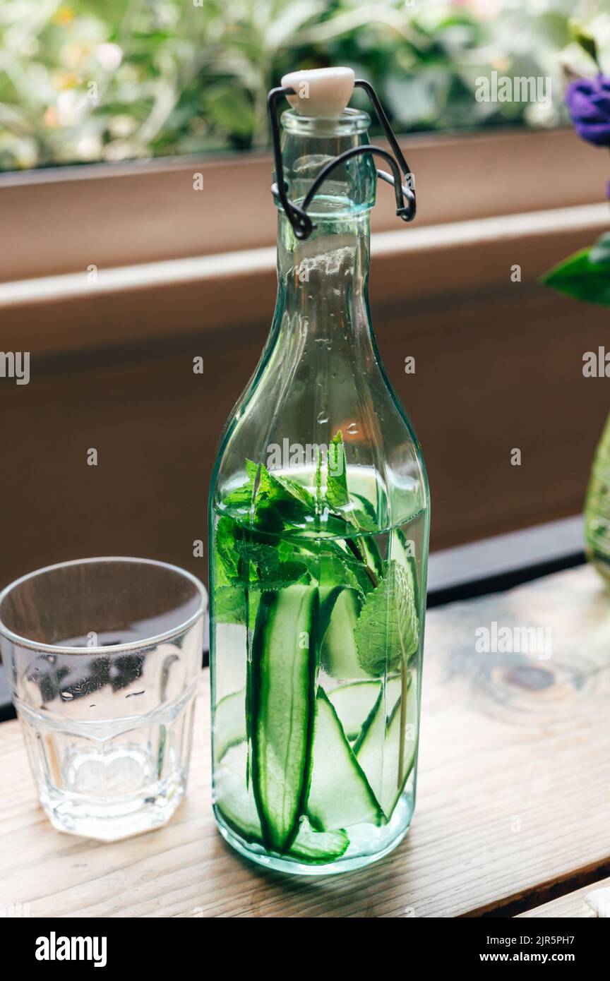 Cucumber water in the bottle Stock Photo - Alamy