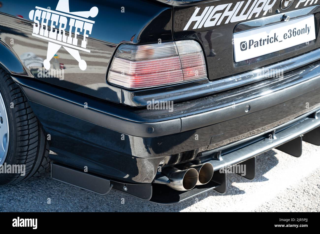 The details of a BMW E36 police pursuit car patrolling on a road Stock ...