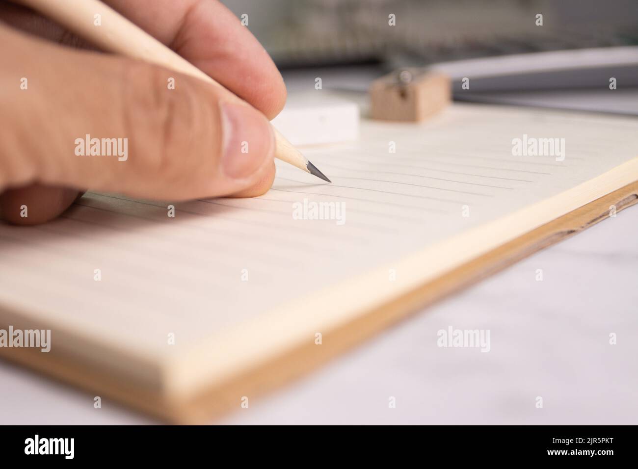 hand hold pencil write on paper note concept education or work job at ...