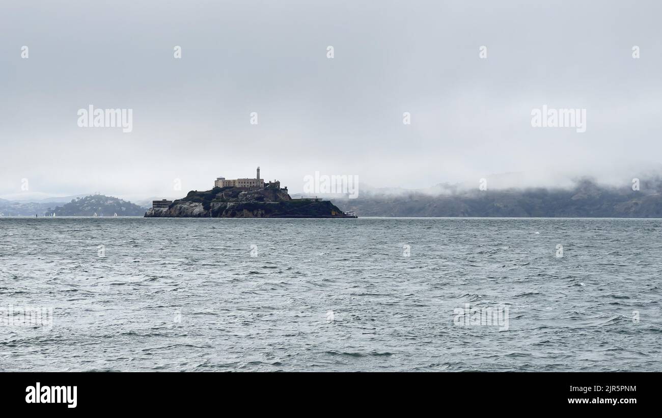 The Alcatraz Island on a cloudy day in San Francisco bay the USA Stock ...