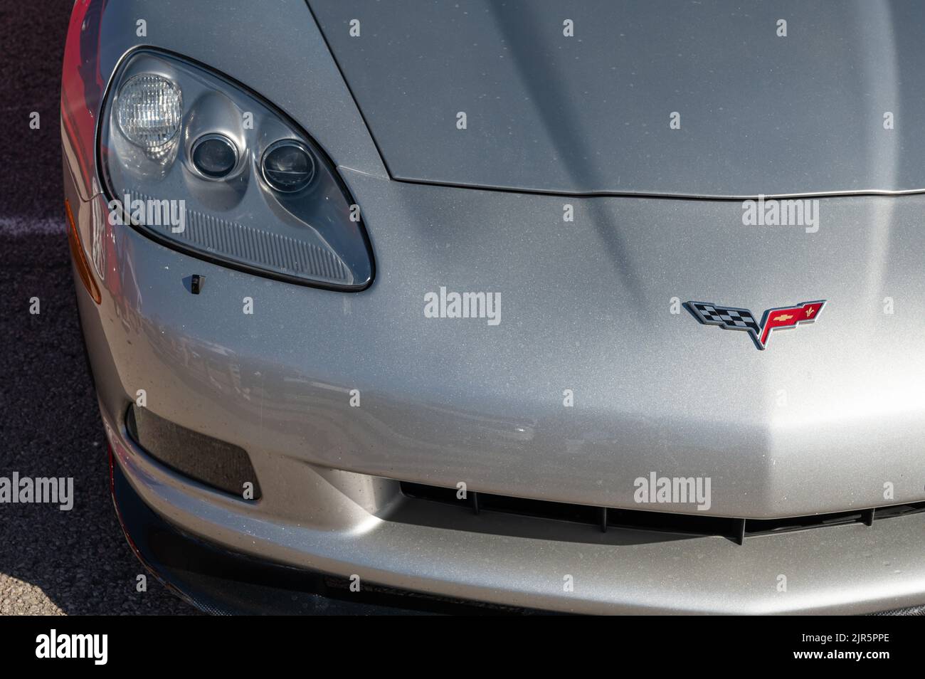 The details on a silver colored Chevrolet Corvette C6 parked on the ...