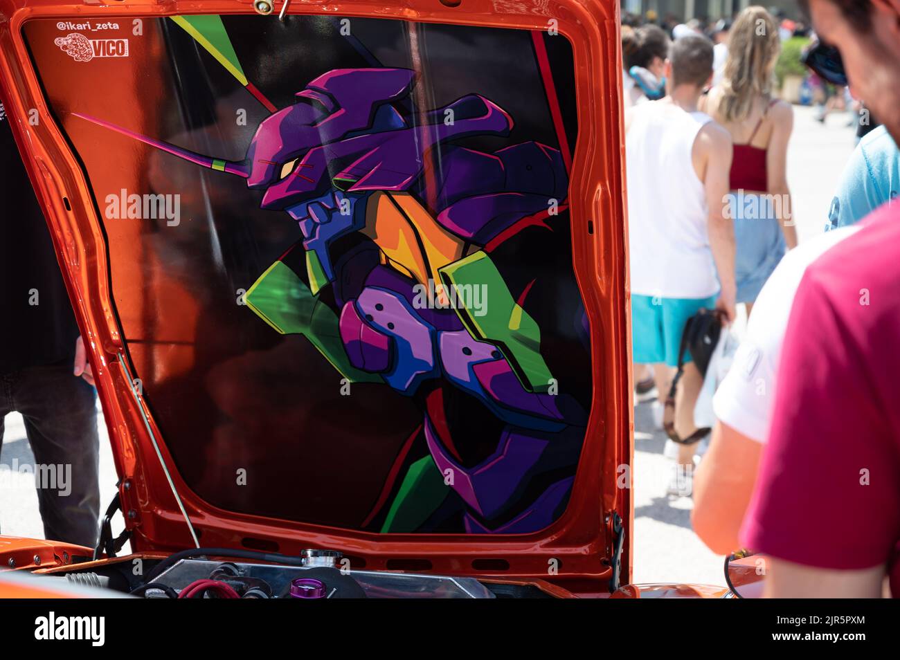 The details of a classic orange Japanese Datsun 240z painted hood parked at the exhibition Stock ...