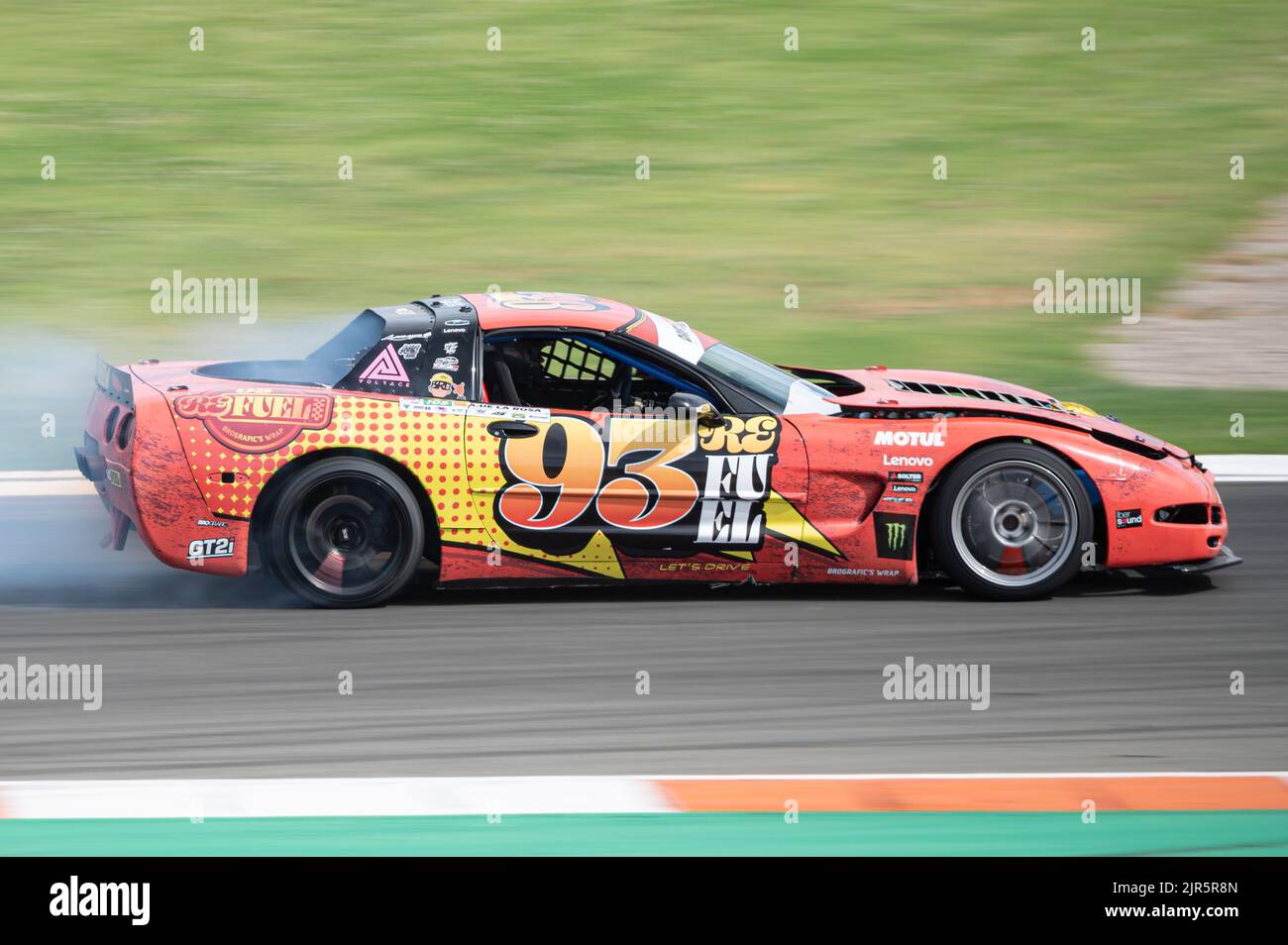 A Chevrolet Corvette C5 racing around on a competition track Stock ...