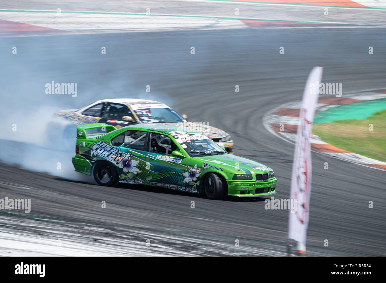 A pair of BMW E36 race cars competing on a track Stock Photo - Alamy