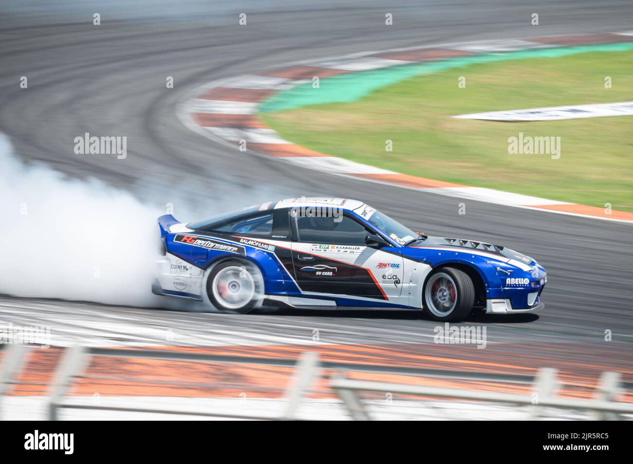 A Japanese sports car Nissan Silvia S13 modified for drift racing on a ...