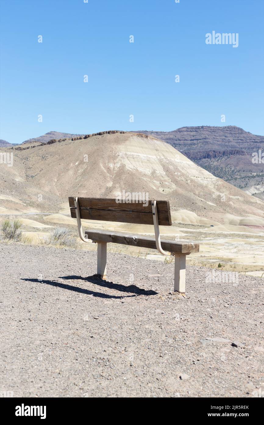 An empty bench facing the Painted Hills in Oregon, USA Stock Photo - Alamy