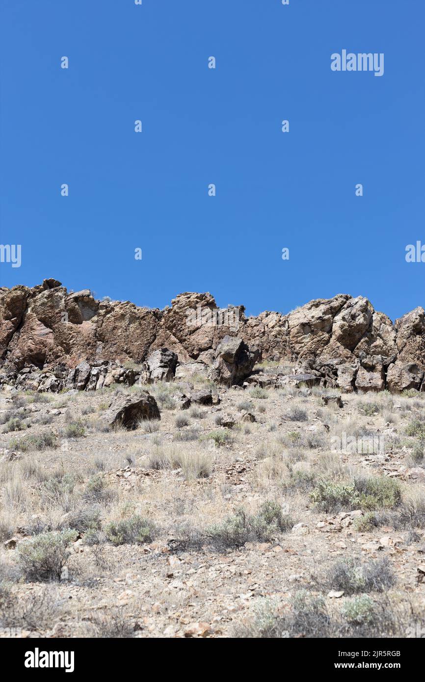 A rocky ridge against a blue sky, on the Carroll Rim Trail at the ...