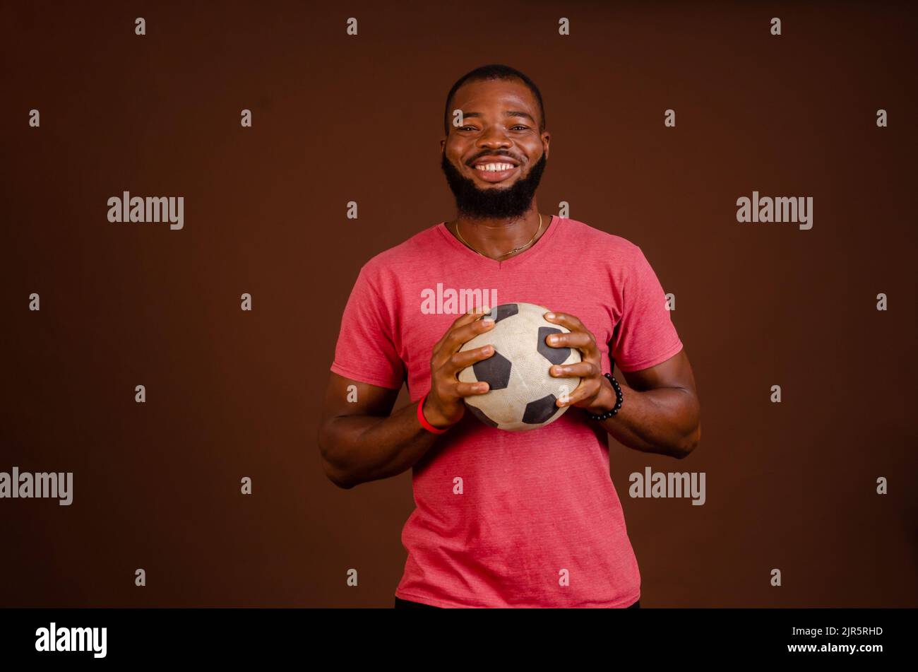 Football fan supporter on white background Stock Photo - Alamy