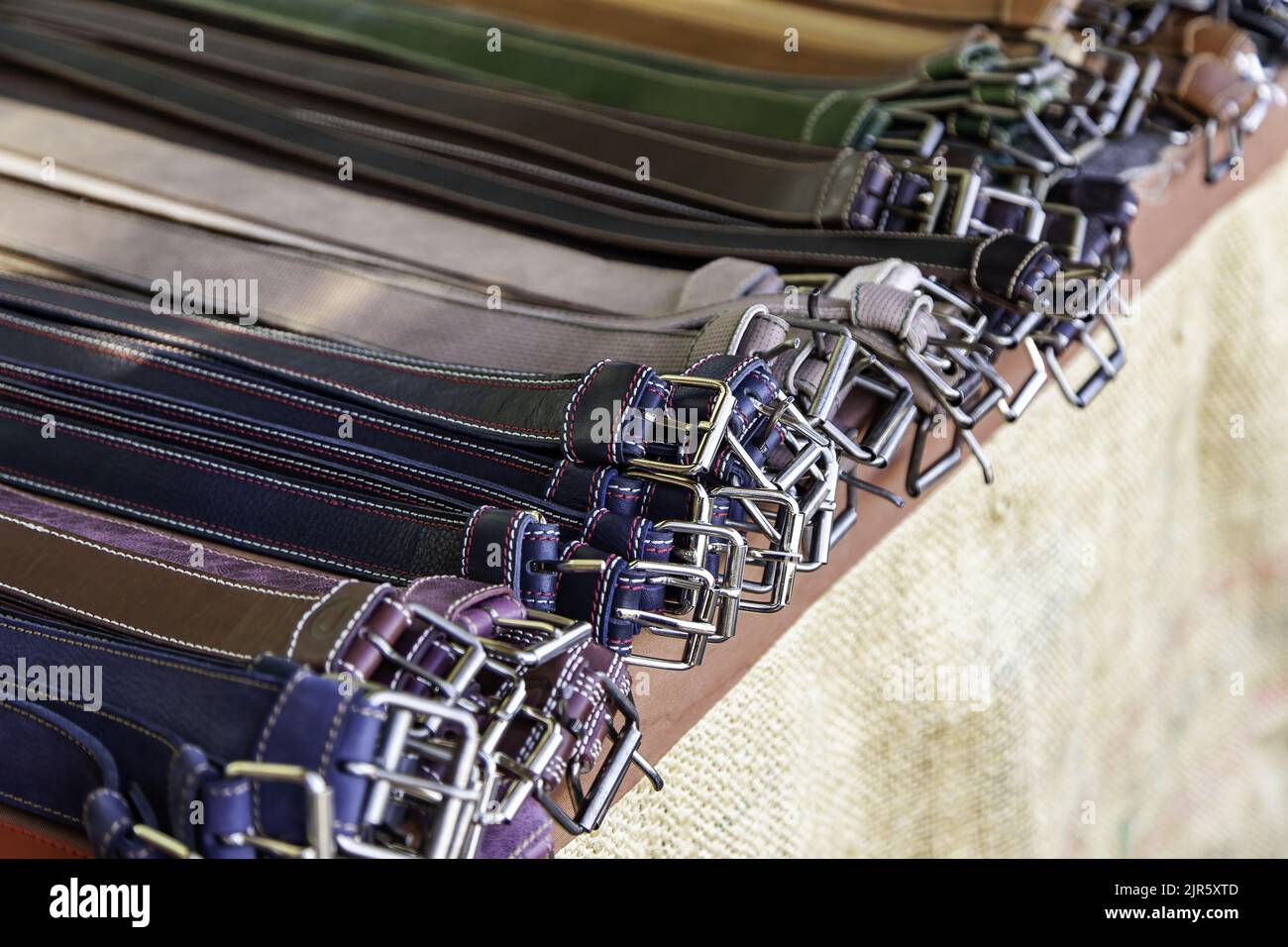 Detail of colored leather belts, crafts and tradition Stock Photo - Alamy
