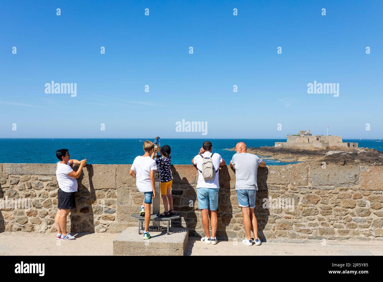 People watching coast line at old wall of the medieval city wall of ...