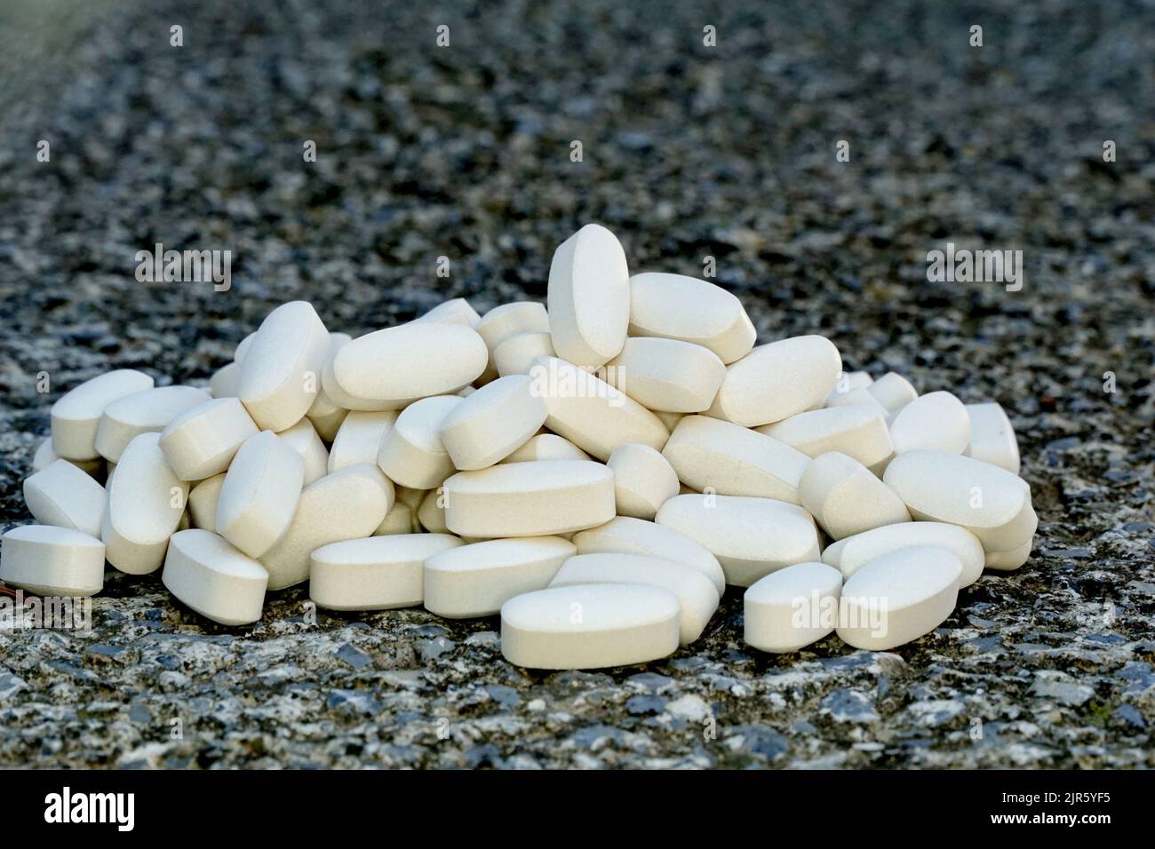 Expired medicine, healthcare concept. prescription drugs on a concrete ...