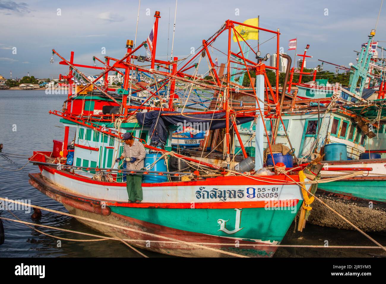 Thai fishing boats at a pier or wharf in Thailand Southeast Asia Stock ...