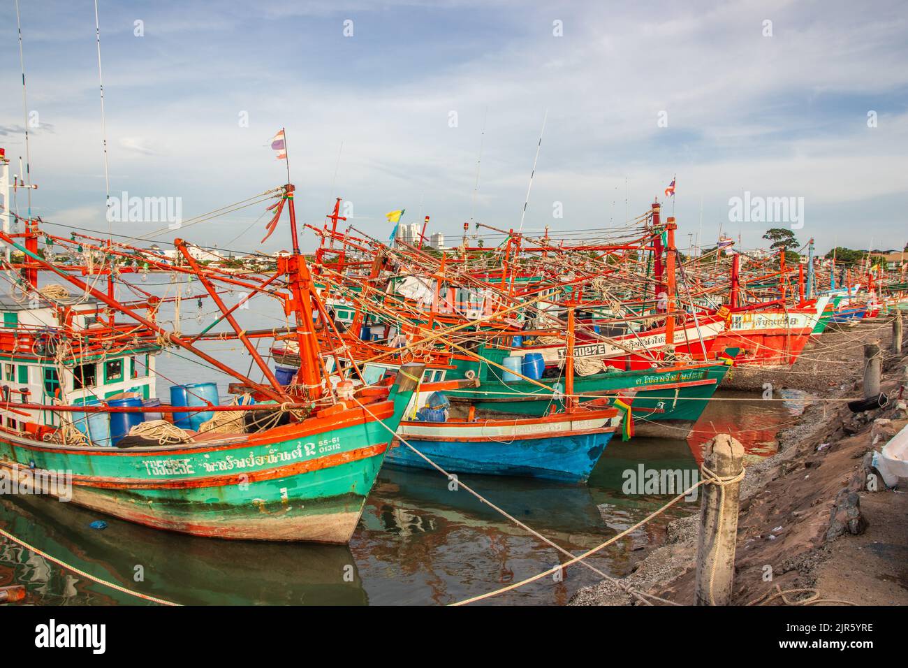 Thai fishing boats at a pier or wharf in Thailand Southeast Asia Stock ...