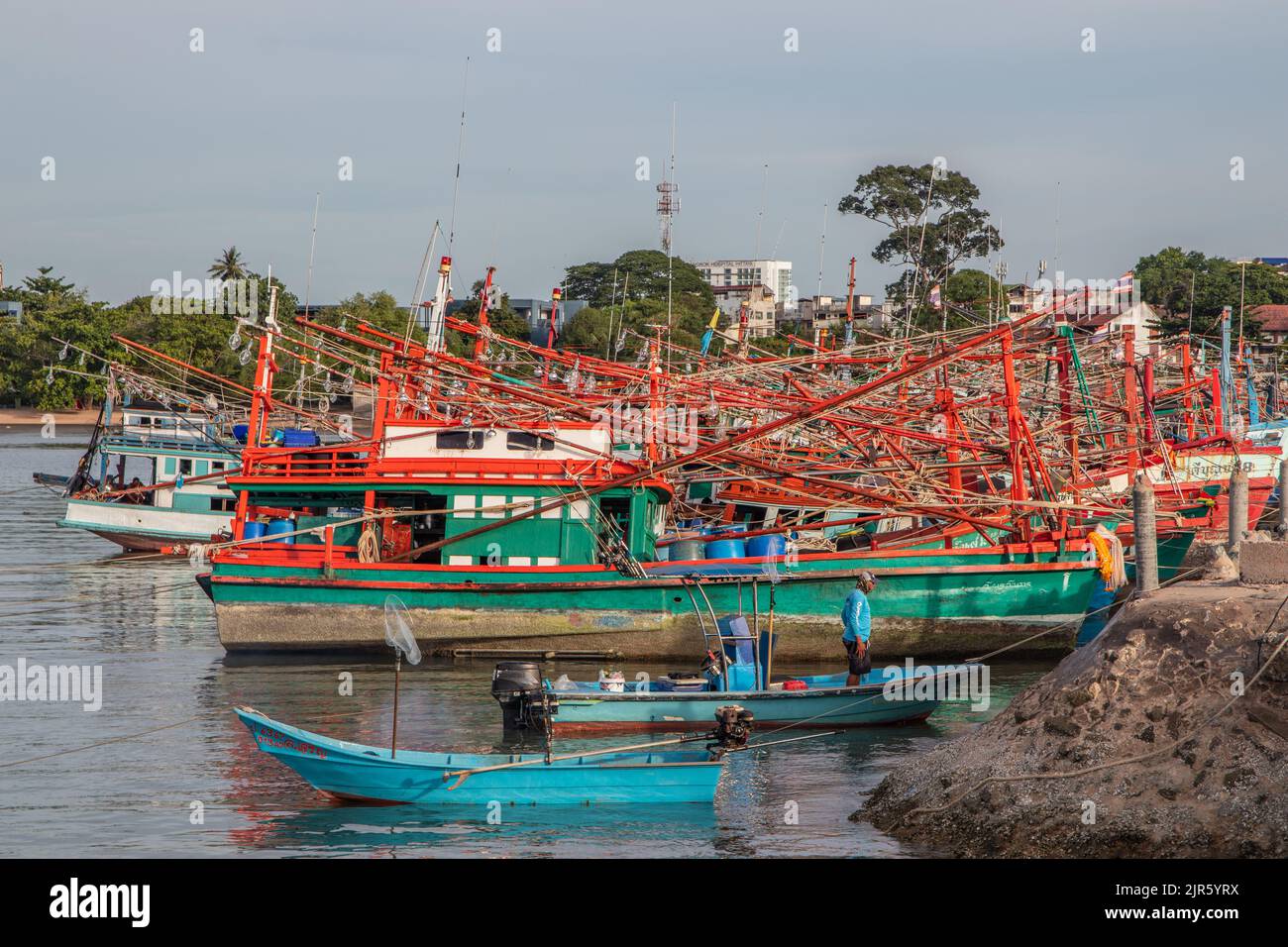Thai fishing boats at a pier or wharf in Thailand Southeast Asia Stock ...