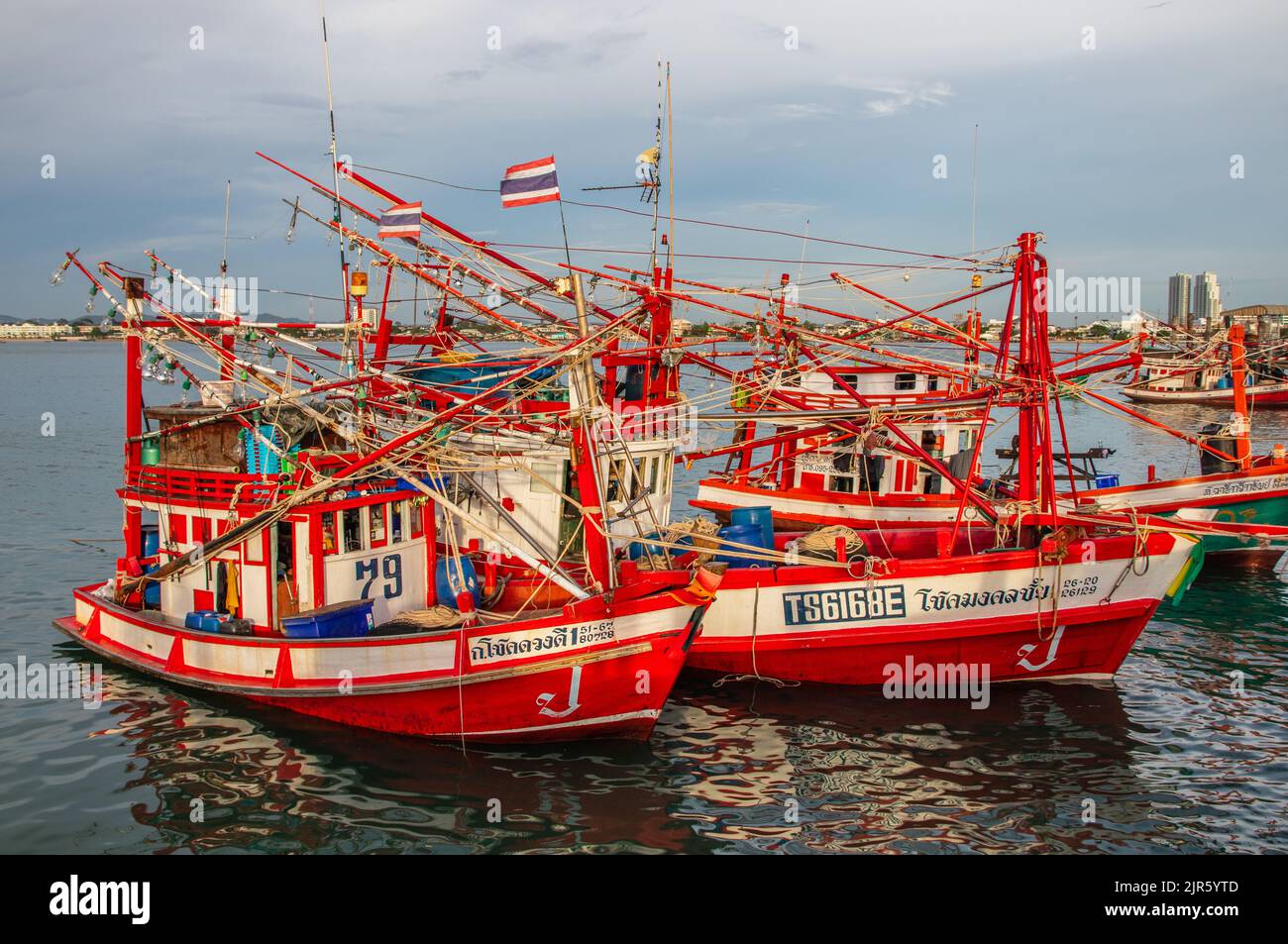 Thai fishing boats at a pier or wharf in Thailand Southeast Asia Stock ...