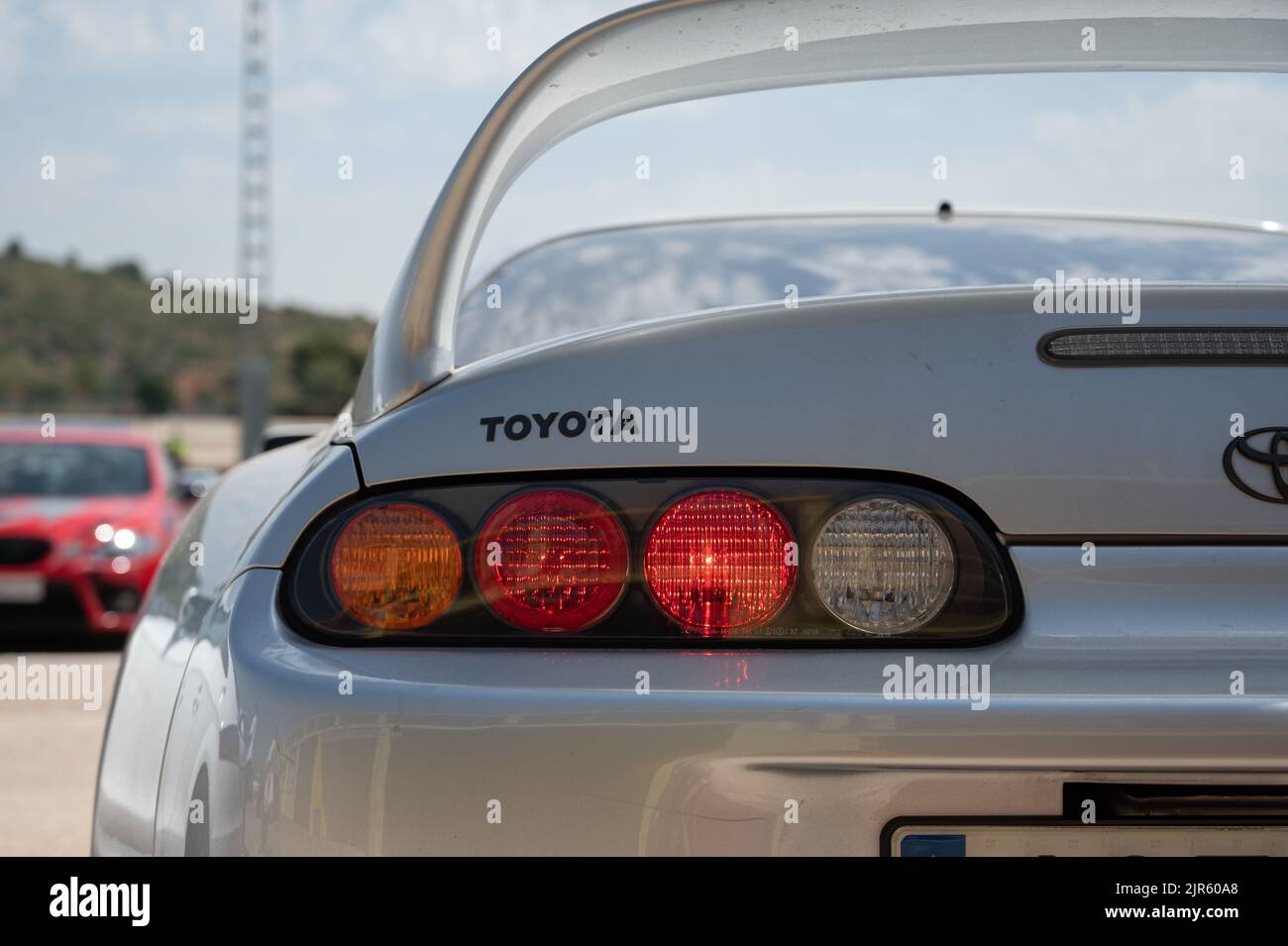 The rear view of a white Toyota Supra sports car Stock Photo - Alamy