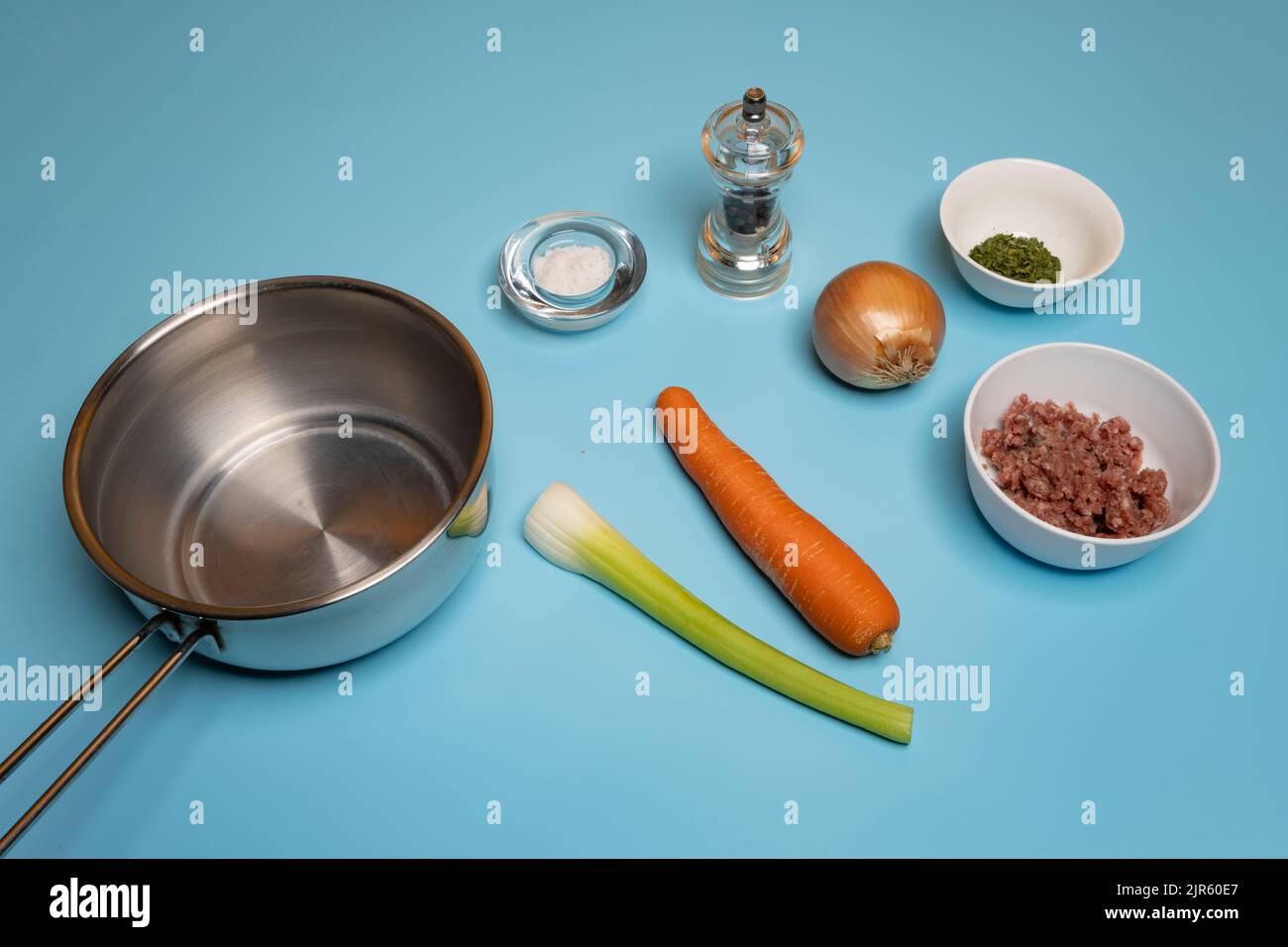 Step 1. the ingredients of the typical Italian meat sauce on the table ...
