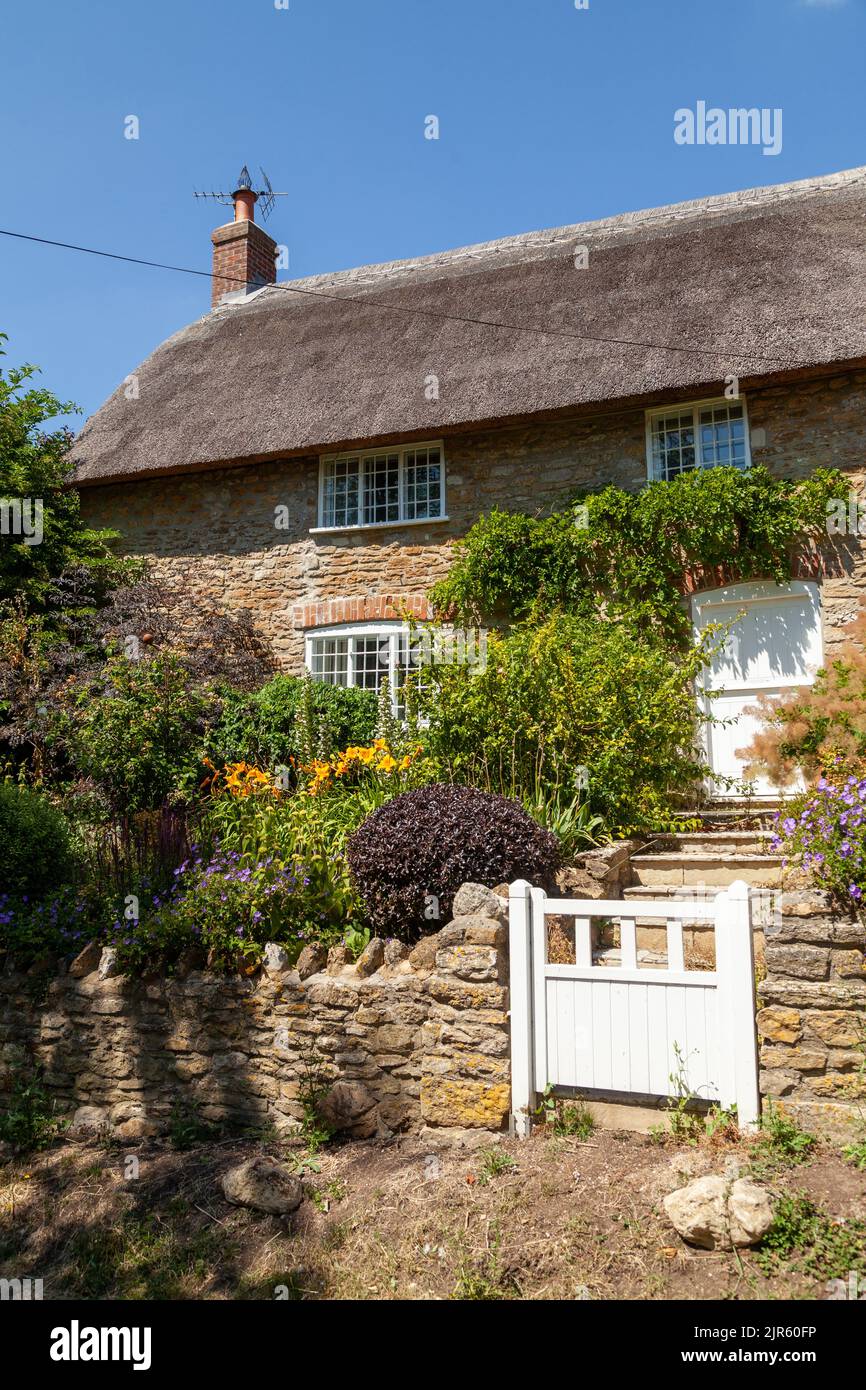 A beautiful thatched house with a cottage garden in Abbotsbury Dorset ...