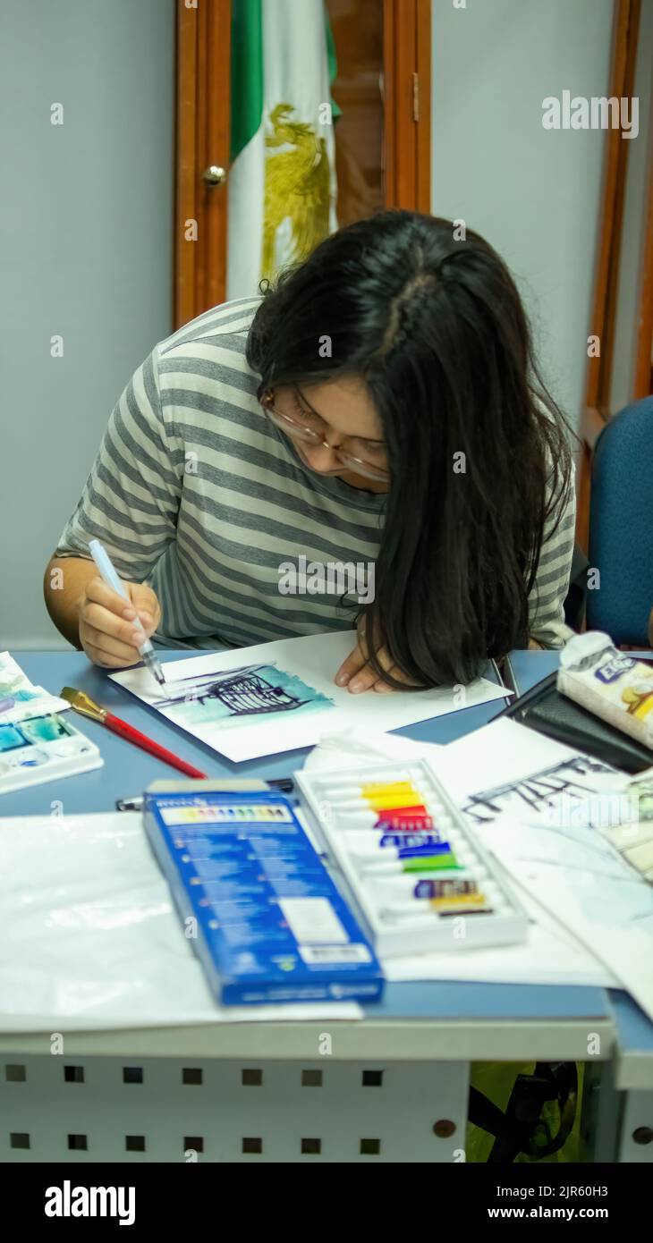 person drawing by hand with pen, pencil and ink, architectural ...